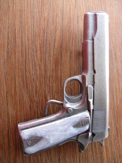 PEARL HANDLED 45 BELT BUCKLE